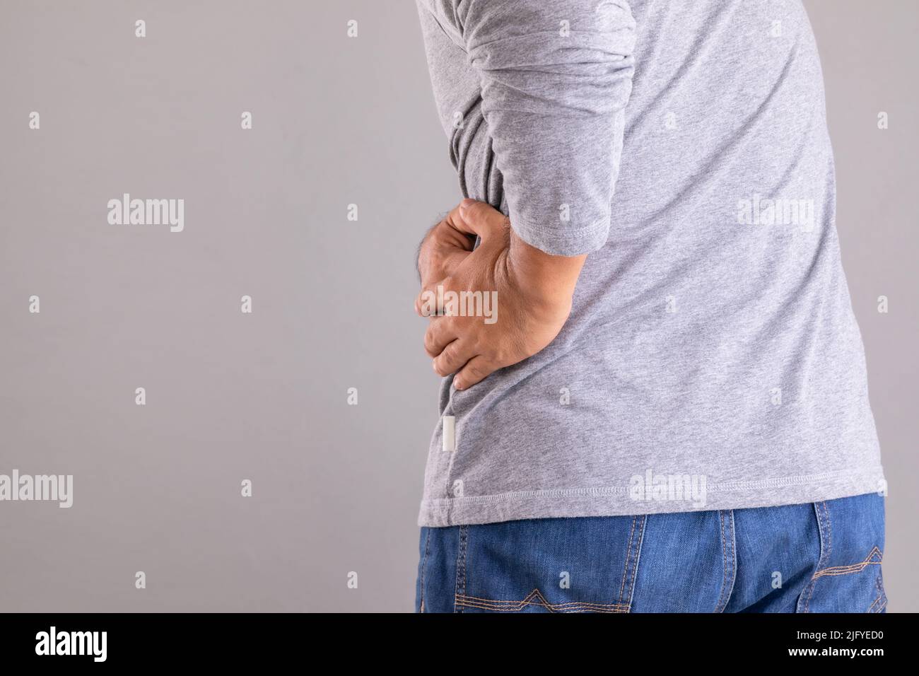 Stomach ache or pain on belly concept : Fat man using his hand and ...