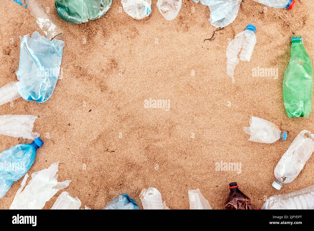 Ecology template. Frame from plastic dirty bottles with copy space. Top ...