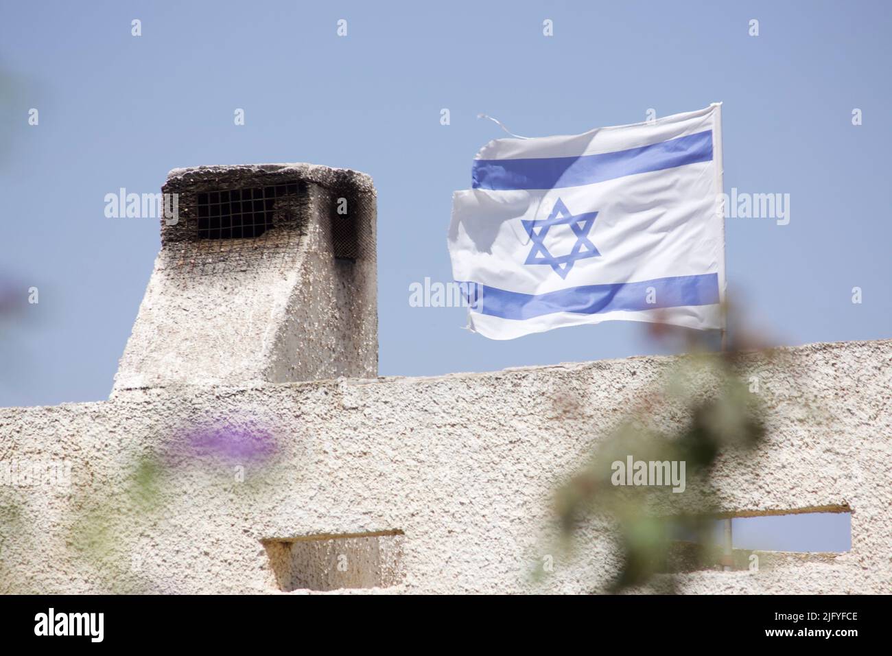 The Flag of Israel on the building Stock Photo - Alamy