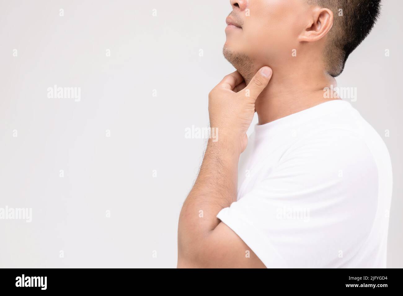 Lymphoma in men concept : Portrait Asian man is touching on his neck at ...