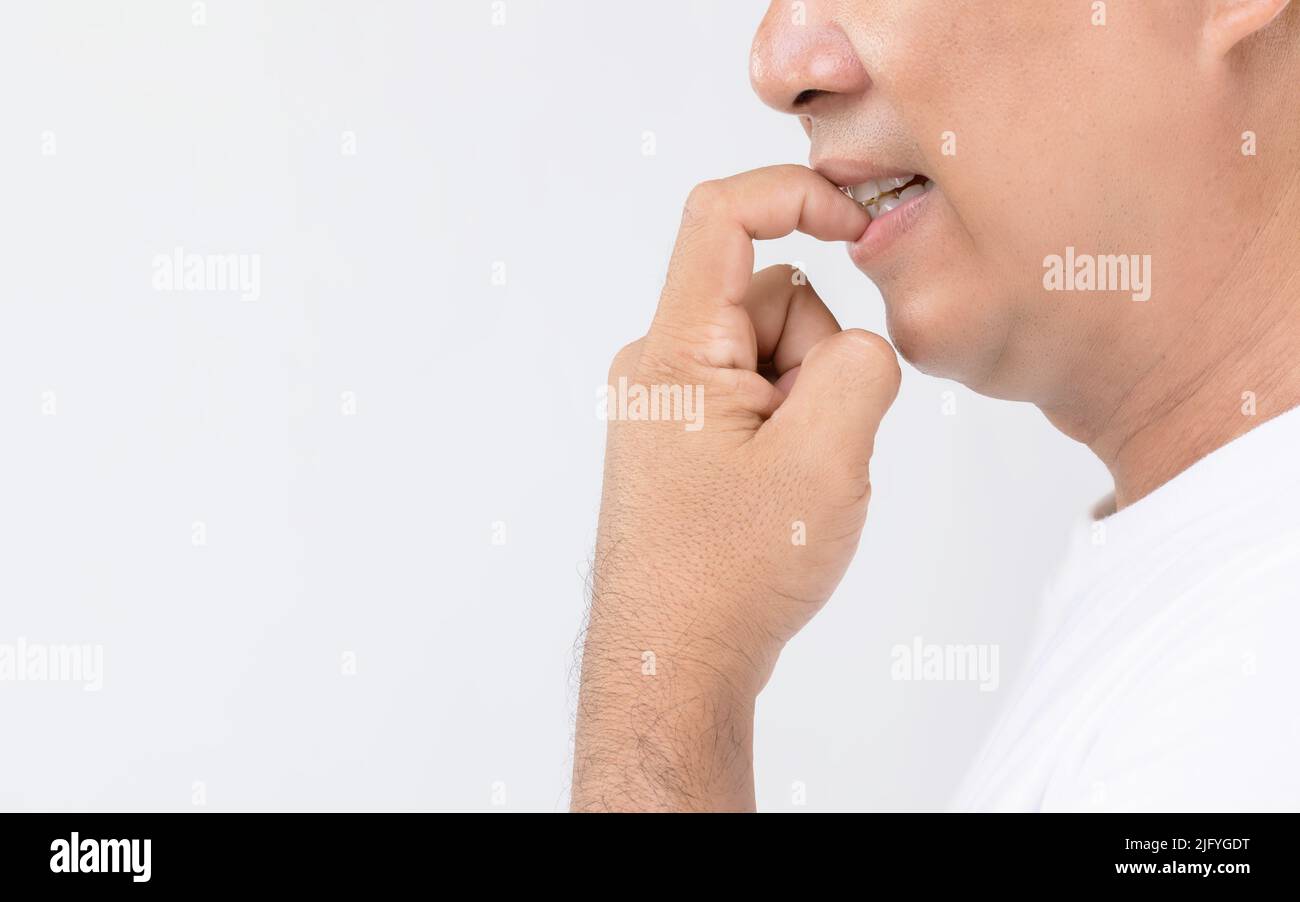 Nail Biting (Onychophagia) concept : Portrait people biting his nail ...