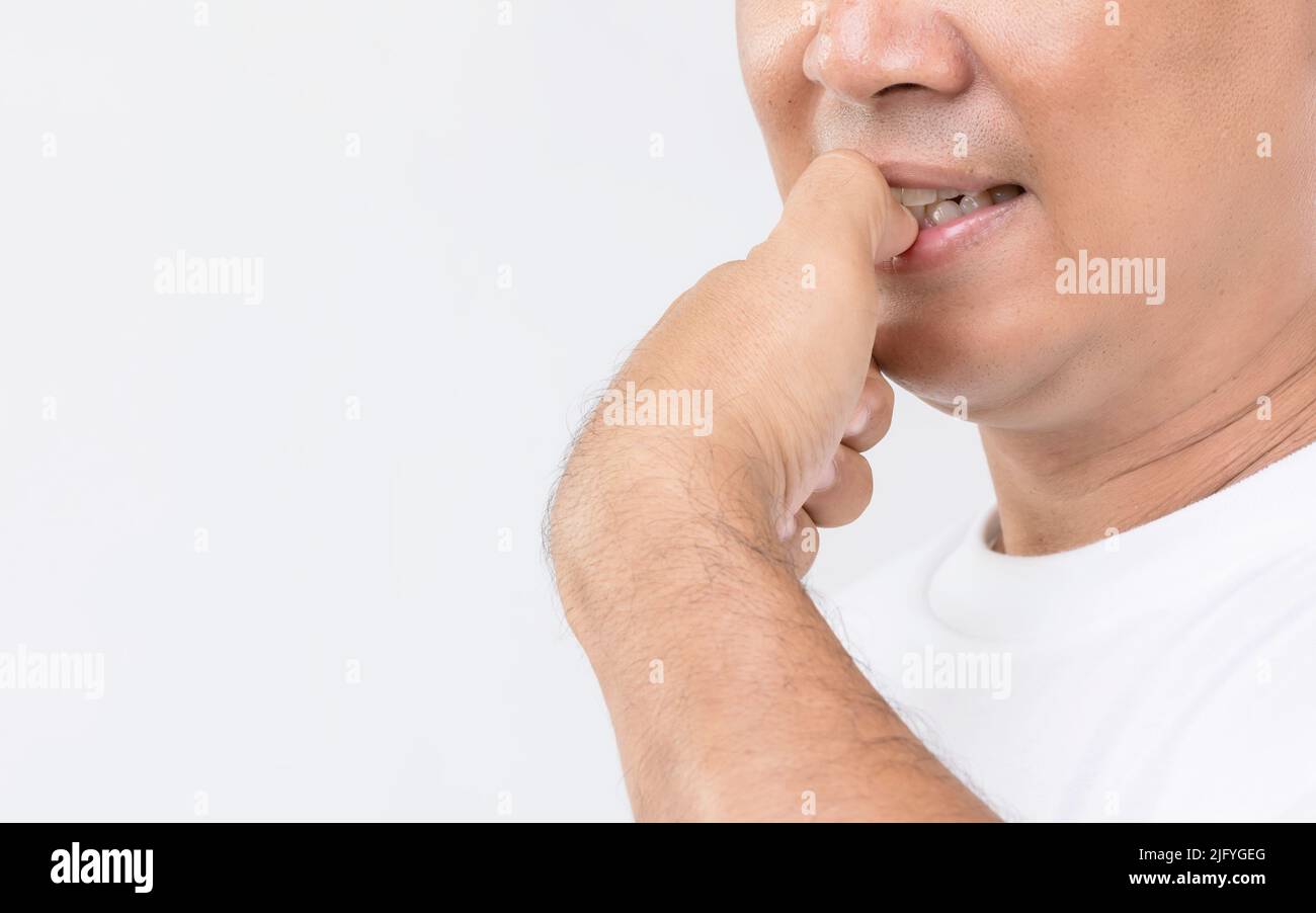 Nail Biting (Onychophagia) concept : Portrait people biting his nail ...