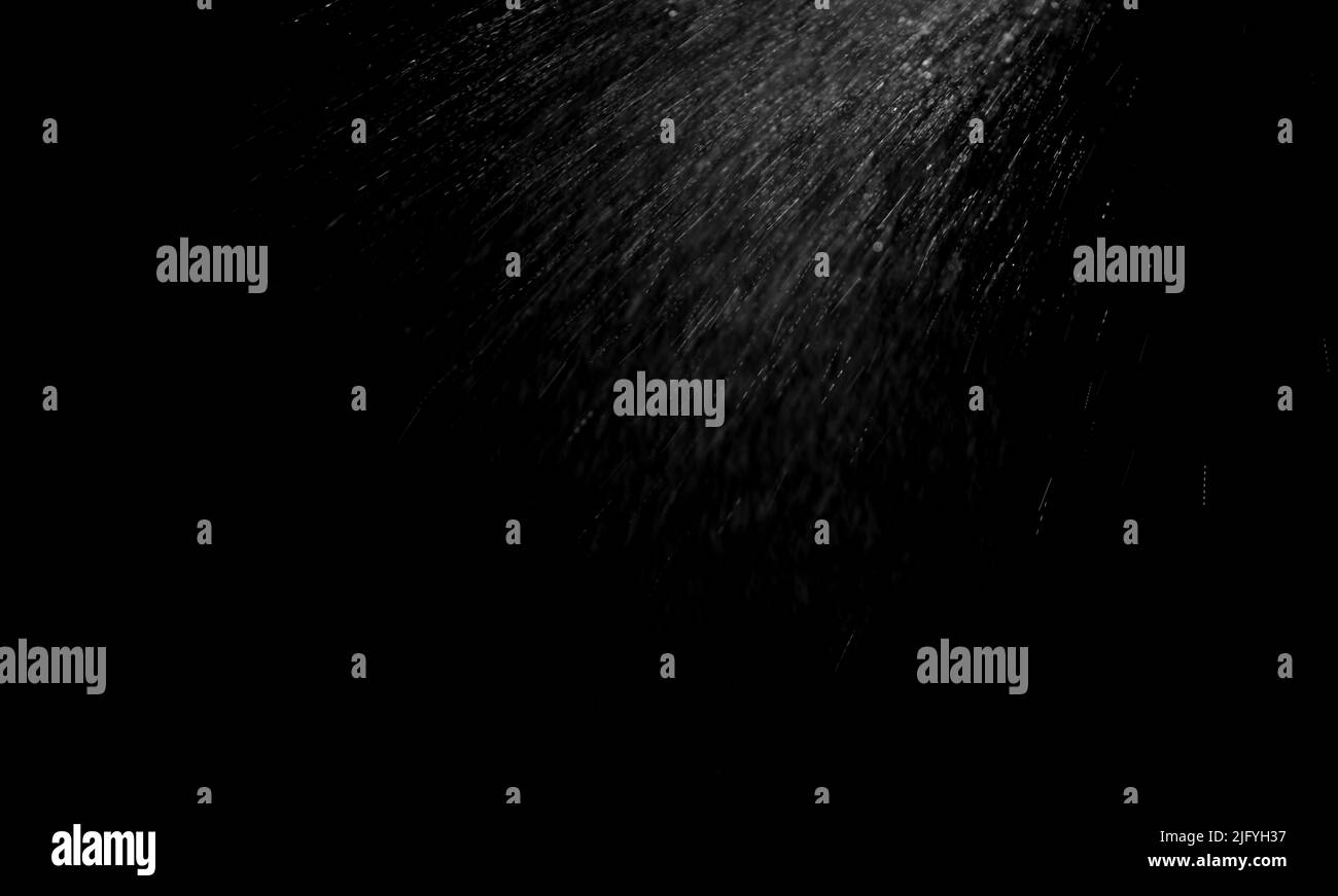 Abstract splashes of Rain and white particles on black background Stock ...