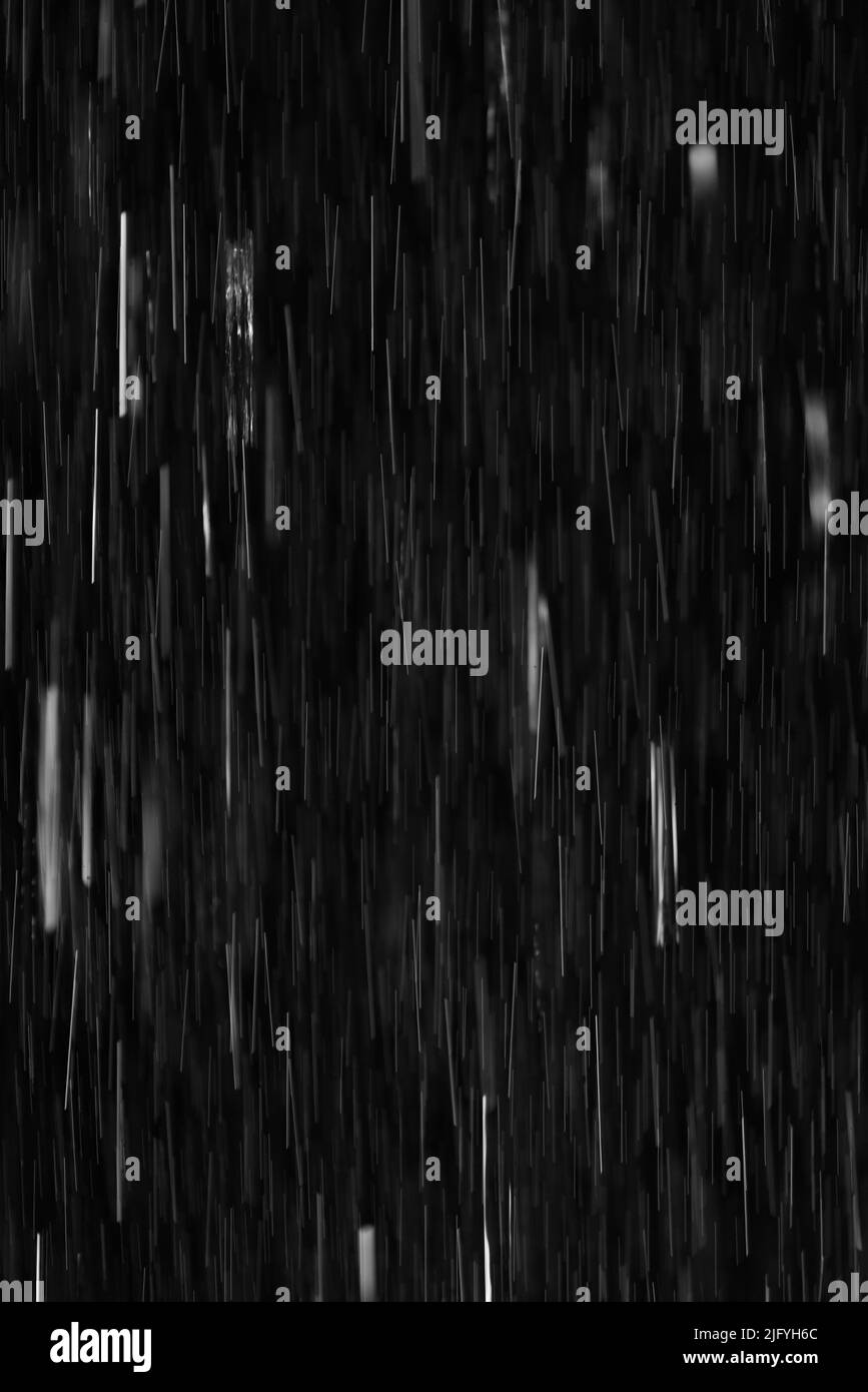 Abstract splashes of Rain and white particles on black background Stock ...