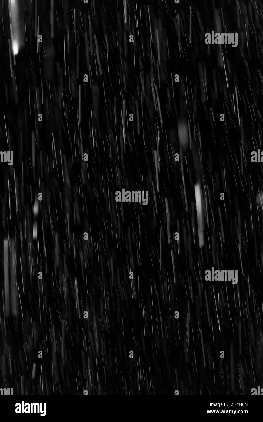 Abstract splashes of Rain and white particles on black background Stock ...