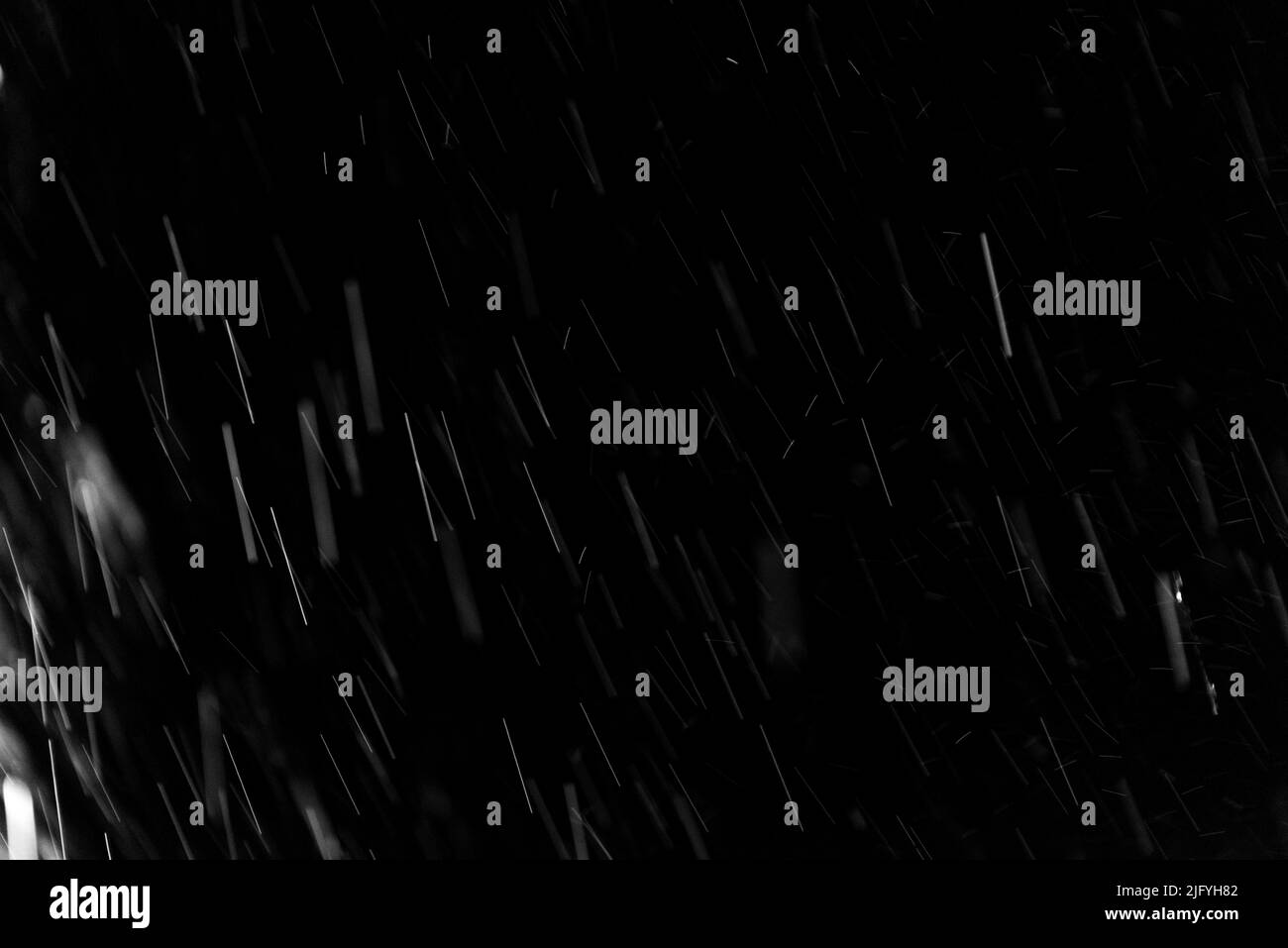Abstract splashes of Rain and white particles on black background Stock ...