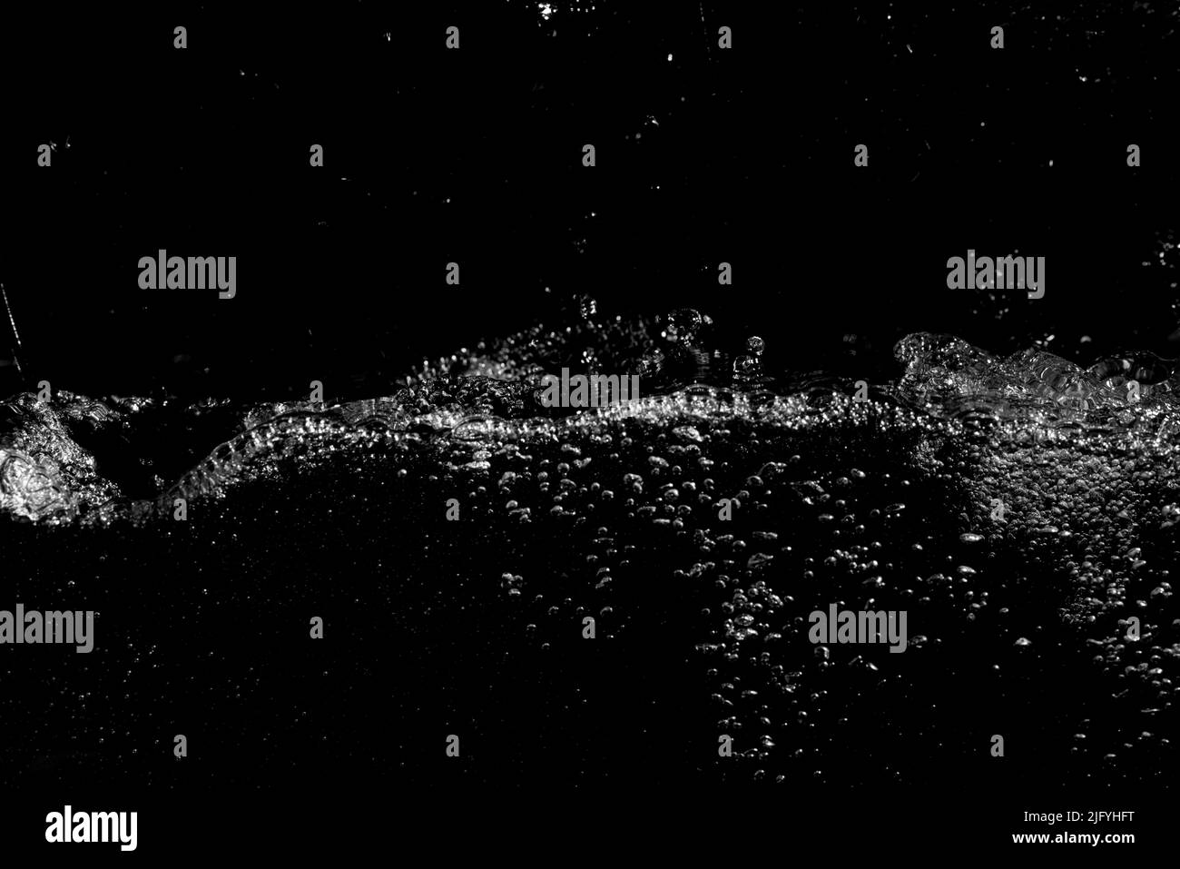 Abstract splashes of Rain and white particles on black background Stock ...