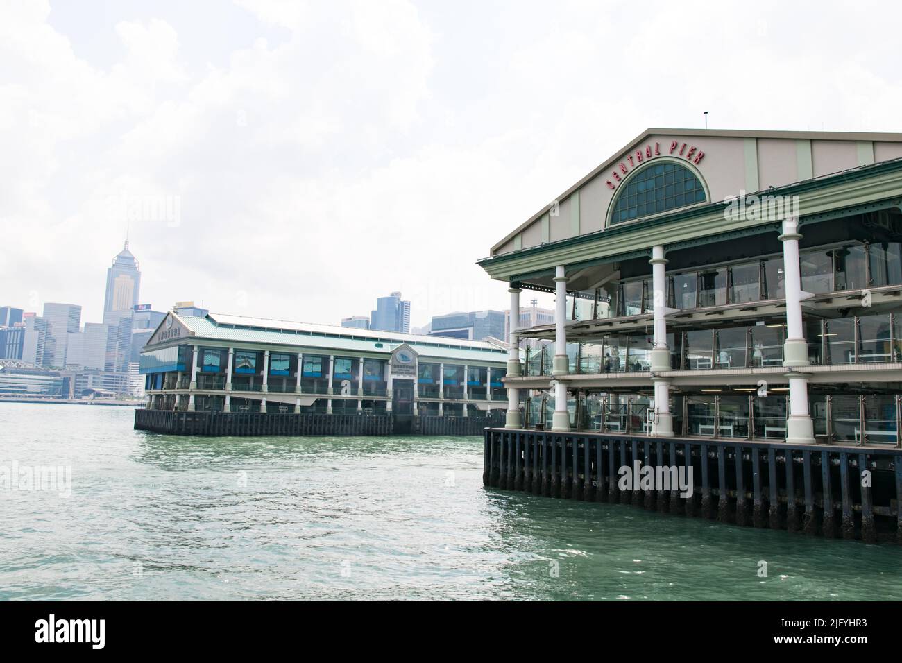 Star Ferry Central Pier harbor with Hong Kong's skyscrapers in the ...
