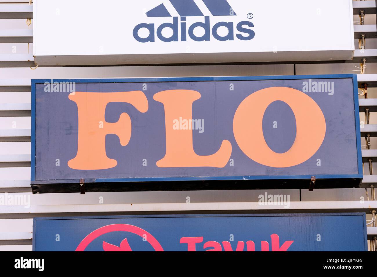 30 May 2022, Antalya, Turkey: Flo brand logo on an exterior of a ...
