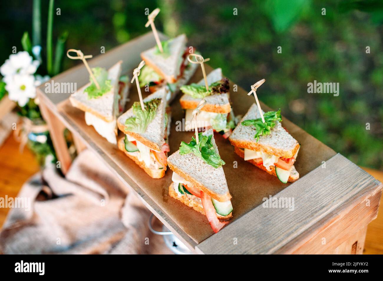 Delicious catering banquet buffet table decorated in rustic style in ...