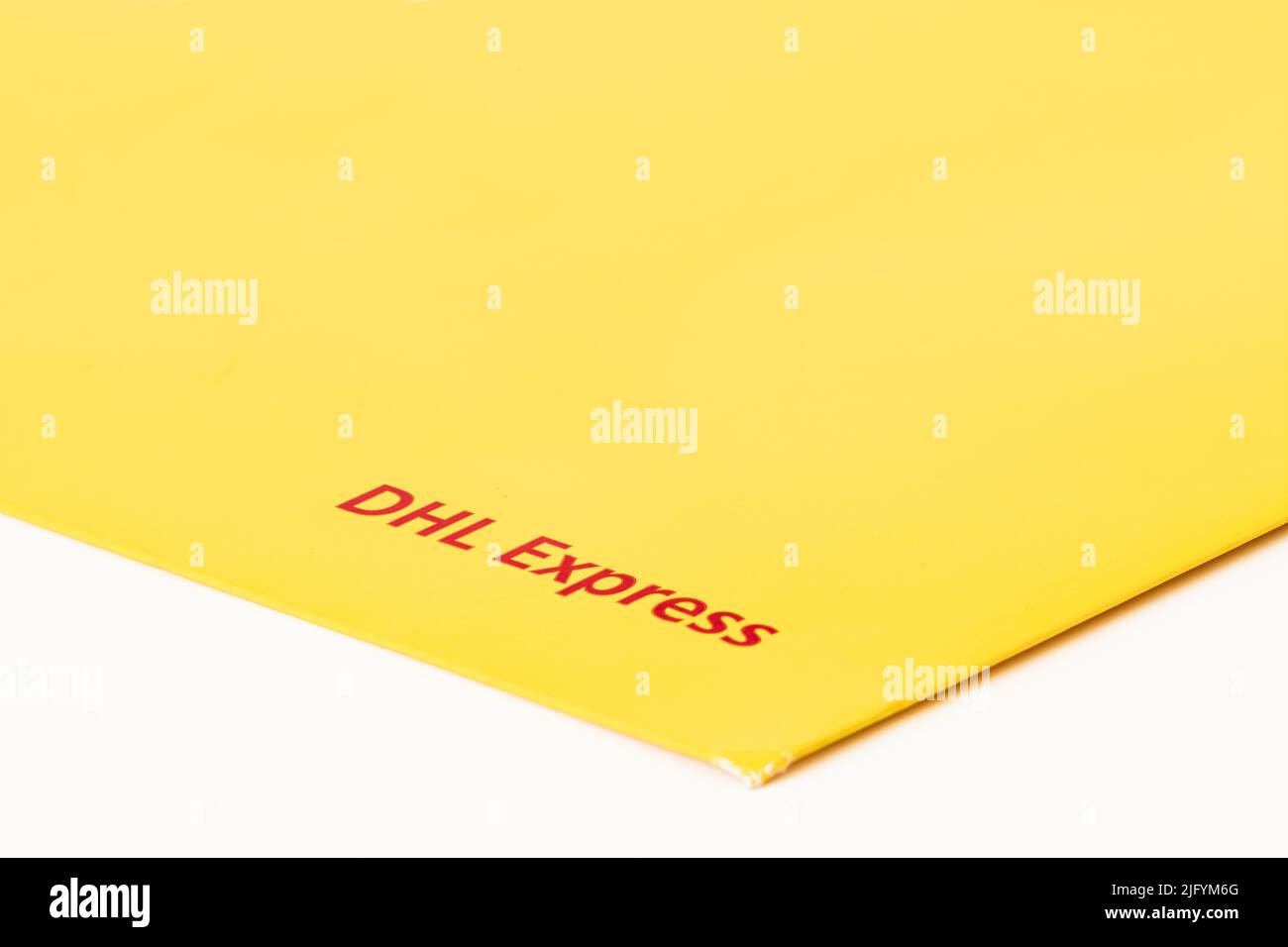03 June 2022, Antalya, Turkey: DHL express delivery postal envelope on ...