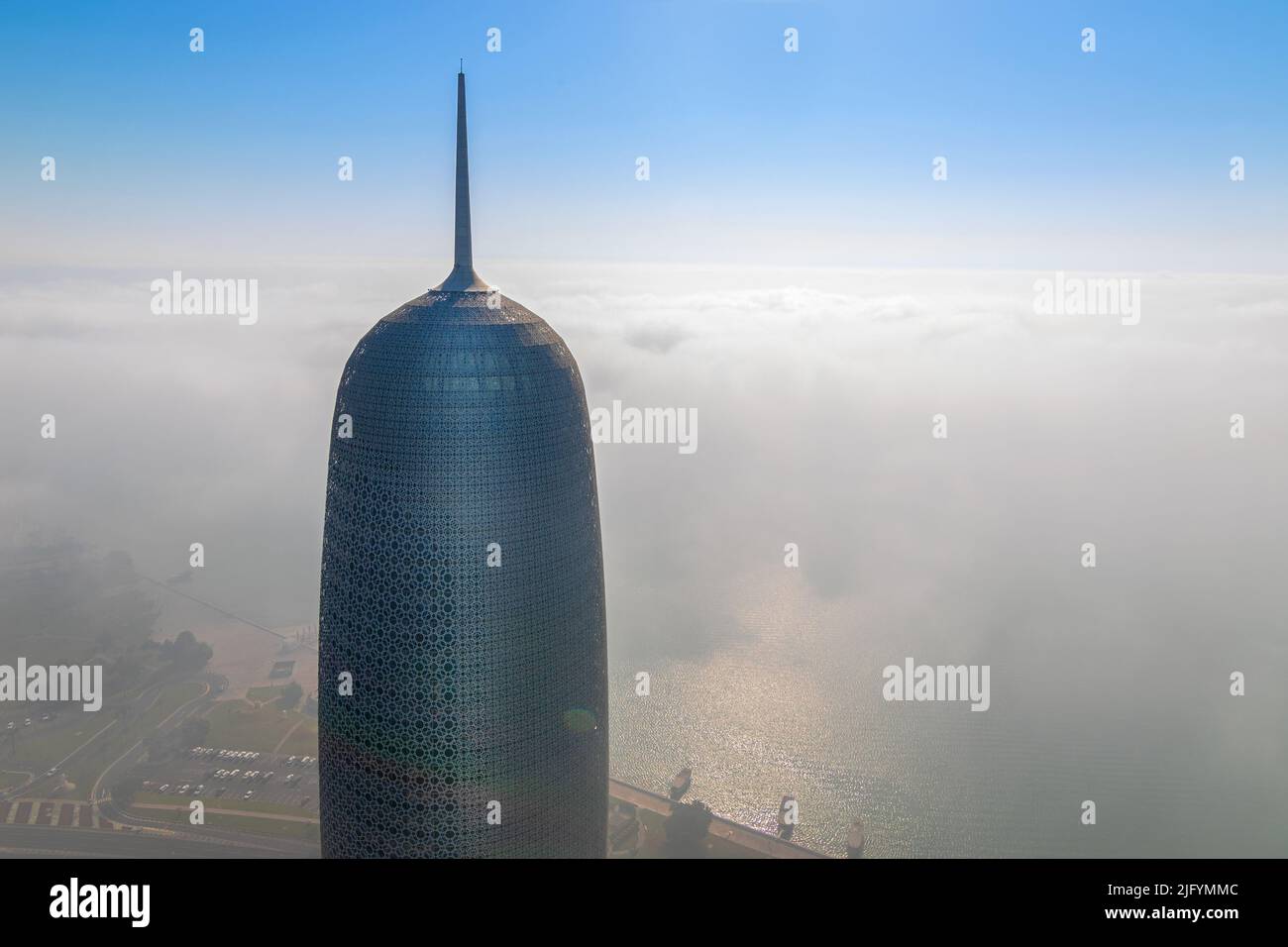 Sunrise Foggy view of Burj Doha . Iconic Doha Tower Stock Photo - Alamy