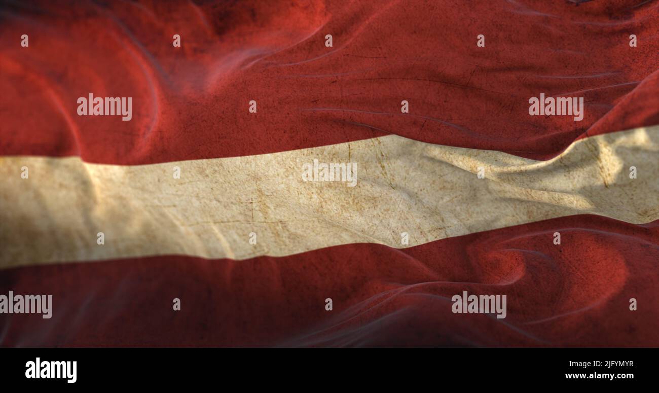 Old Latvia Flag waving at wind Stock Photo - Alamy