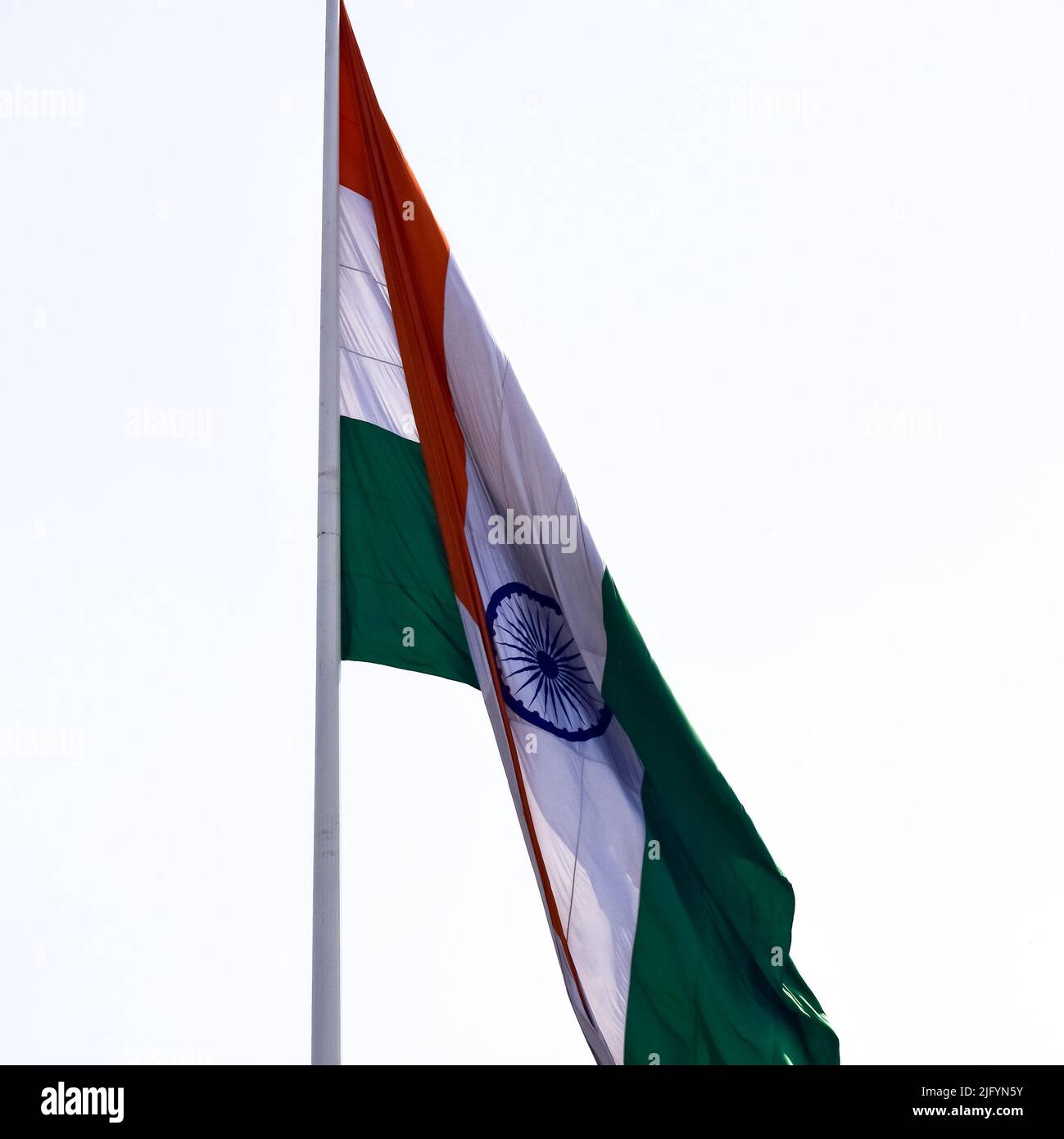 India flag flying high at Connaught Place with pride in blue sky, India ...