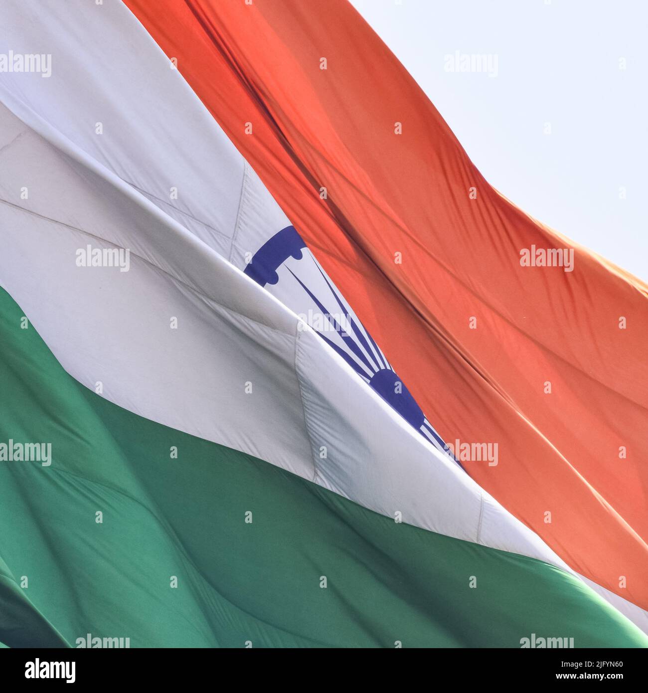 India flag flying high at Connaught Place with pride in blue sky, India ...