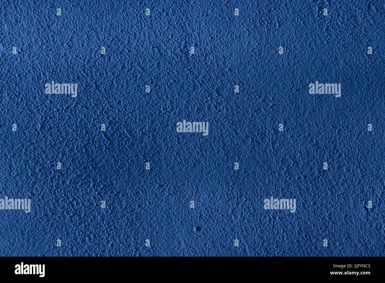 Blue colored abstract wall background with textures of different shades ...