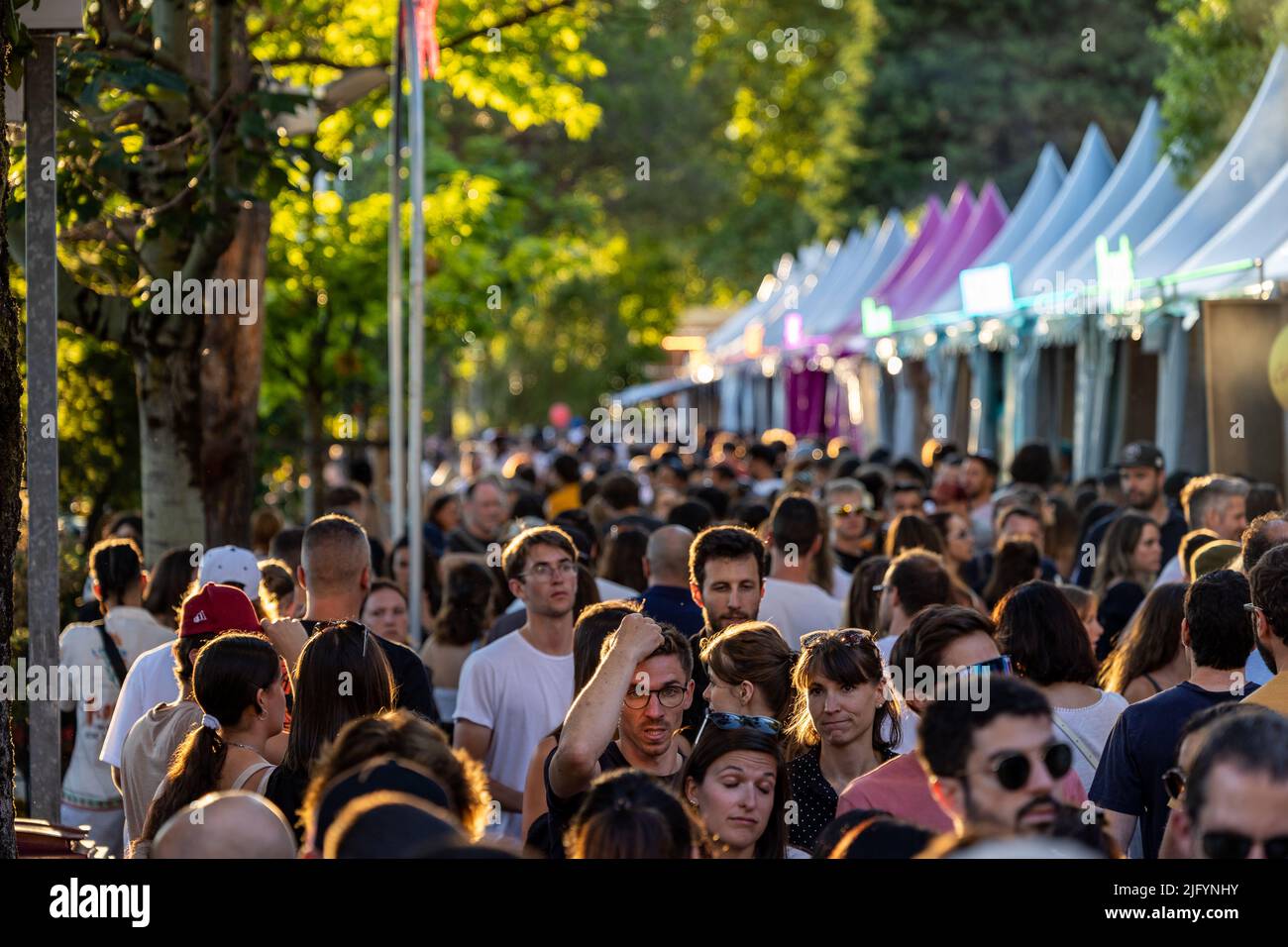 Crowds by the Lake Geneva at Montreux Jazz Festival. The food street is ...