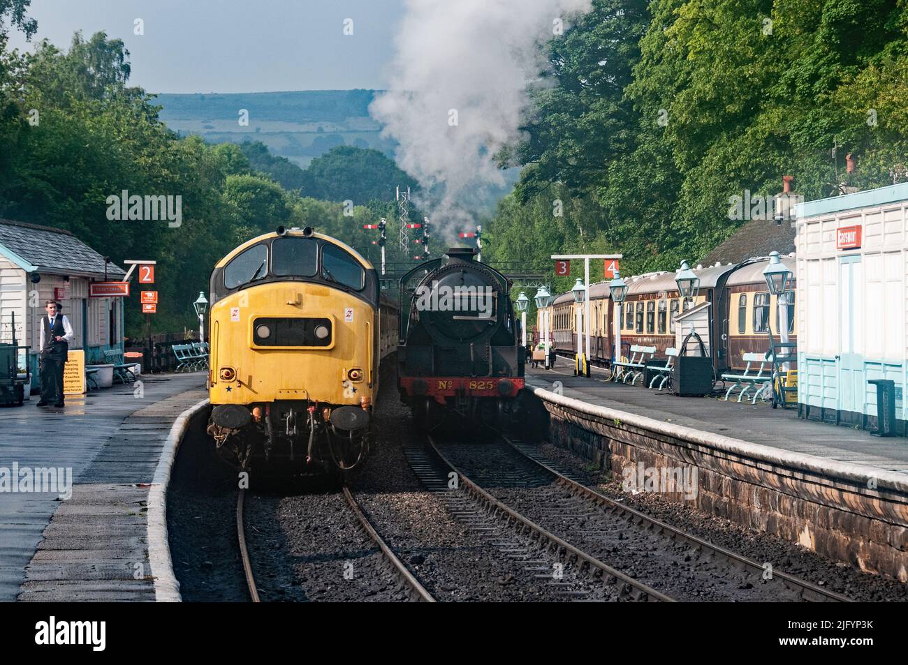 Around the UK - Steam Locomotive SR S15 class No. 825, passing a BR ...