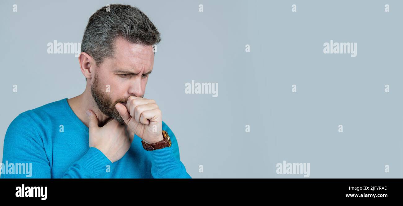 Man face portrait, banner with copy space. sick man has cough on grey ...