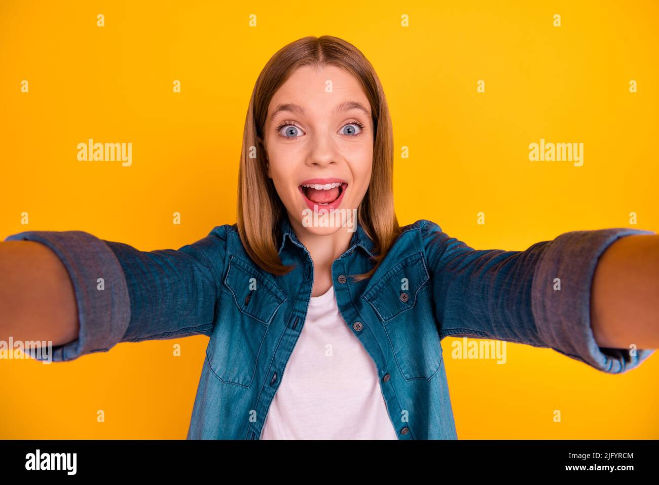 Portrait of astonished excited girl make selfie open mouth unbelievable ...