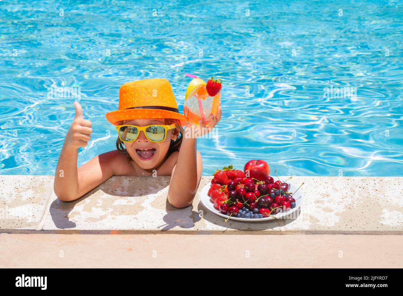 Boy in a strawberry hi-res stock photography and images - Alamy