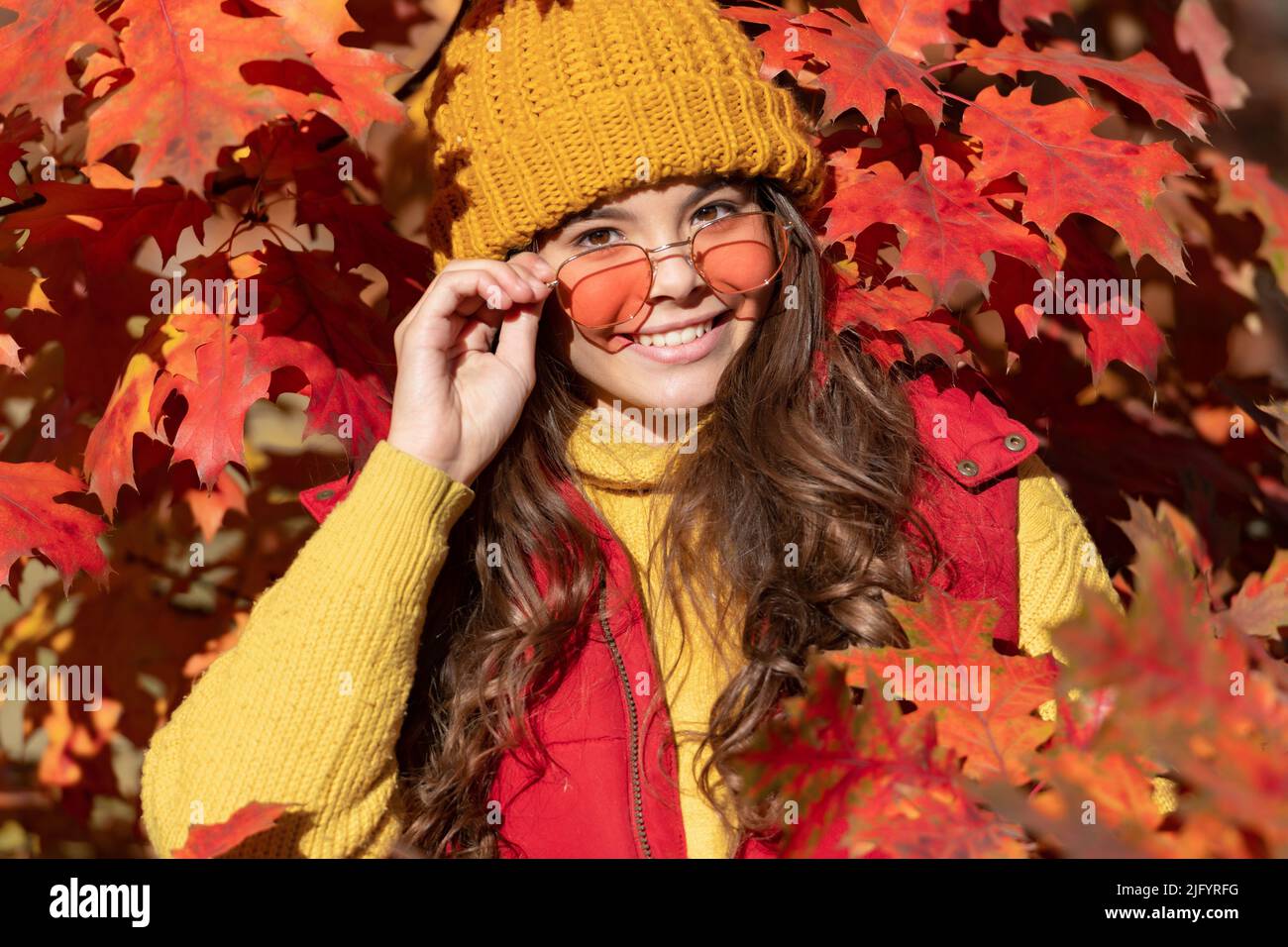 Child teen girl in autumn fall park outdoor, autumn fun kids face ...