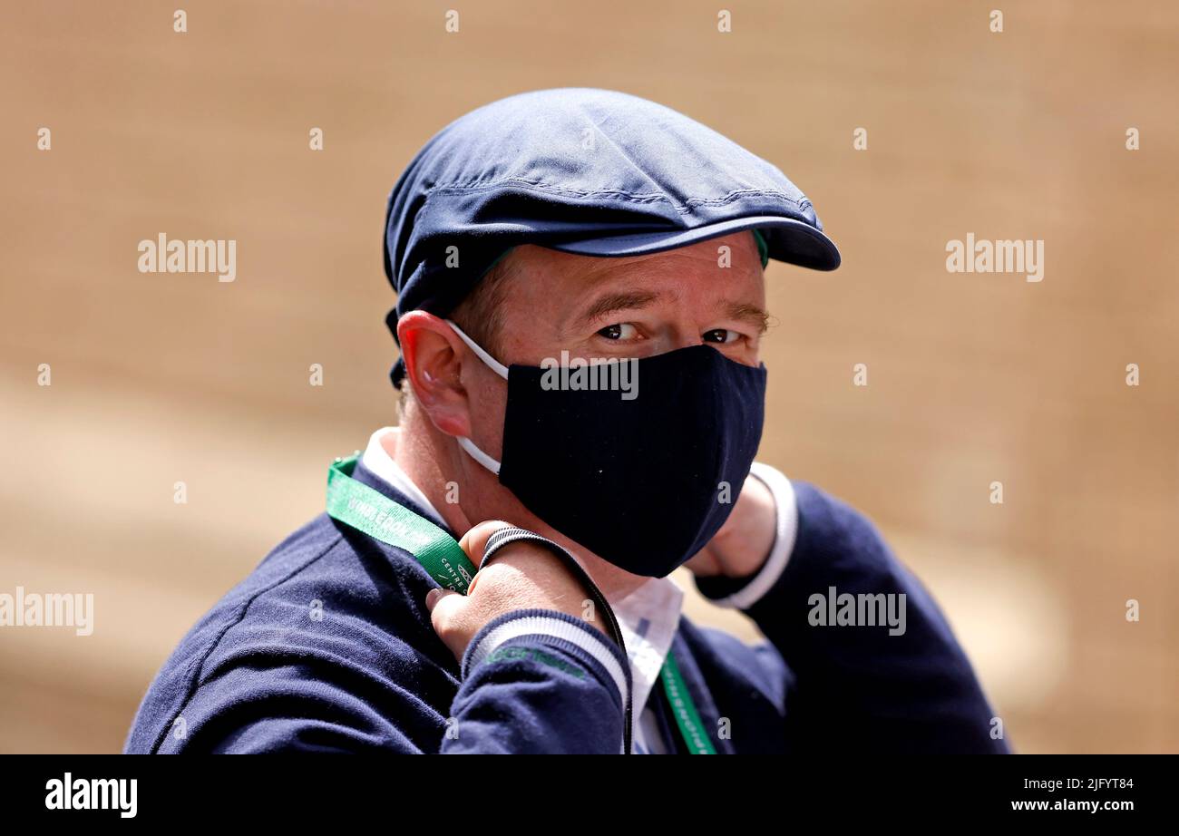 A line judge with a face mask on arrives on day ten of the 2022 ...