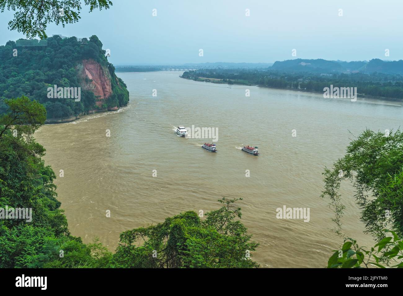 Three sightseeing boats with tourists sailing on the Min River and Dadu ...