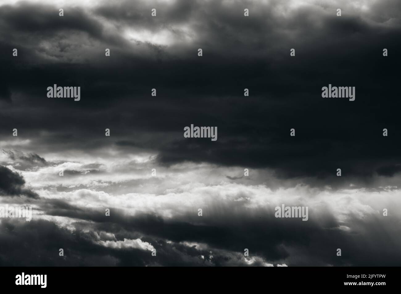 Background dark gray storm clouds are sign of an impending thunderstorm ...