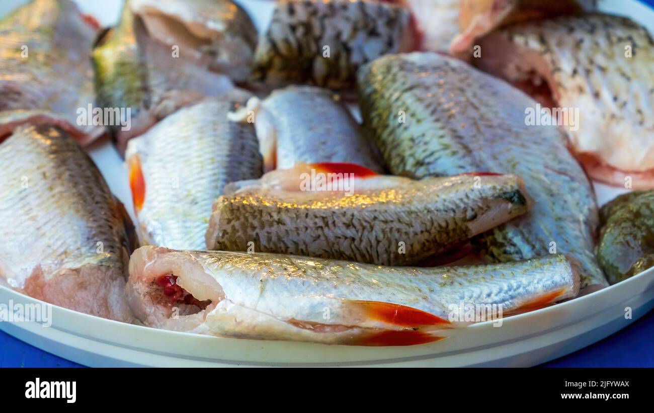 River fish. Cleaned and ready to cook. Front view Stock Photo - Alamy