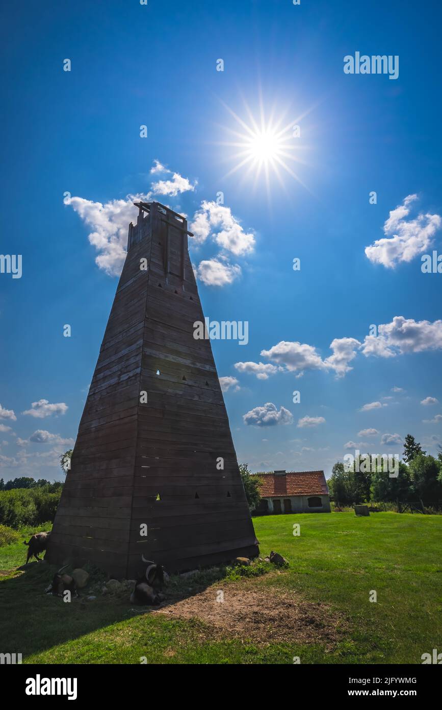 A low angle shot of reconstructed ancient wooden tower used in ...