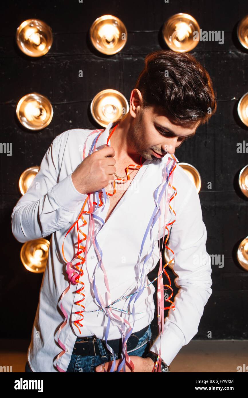 Happy man dancing at new year party Stock Photo - Alamy