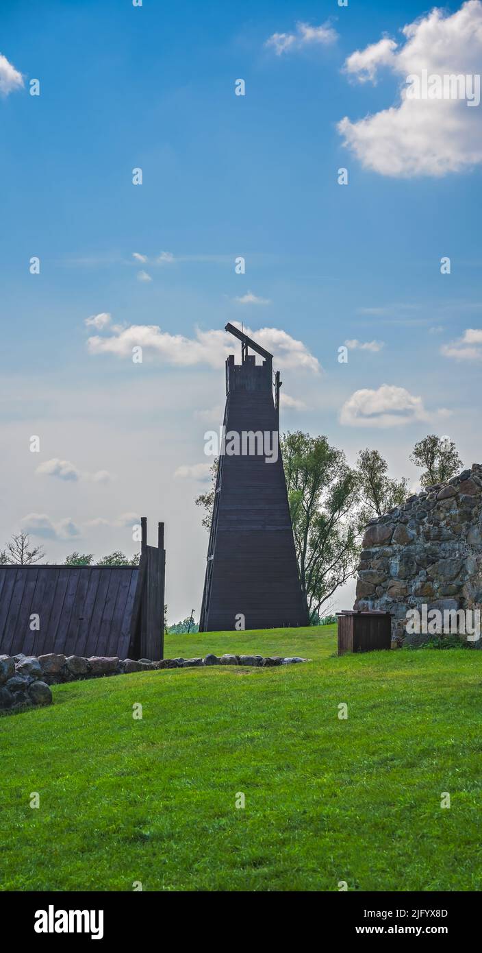A low angle shot of reconstructed ancient wooden tower used in ...