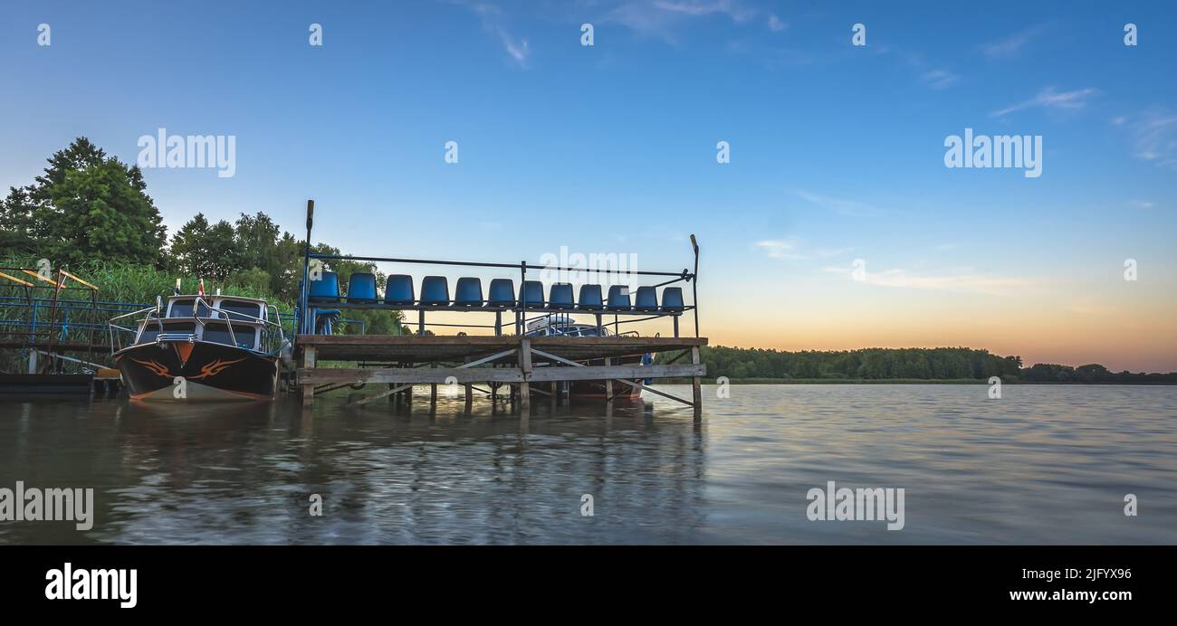 Boat landing and pier on a boat on Jezioro Ostrowieckie in Poland Stock ...