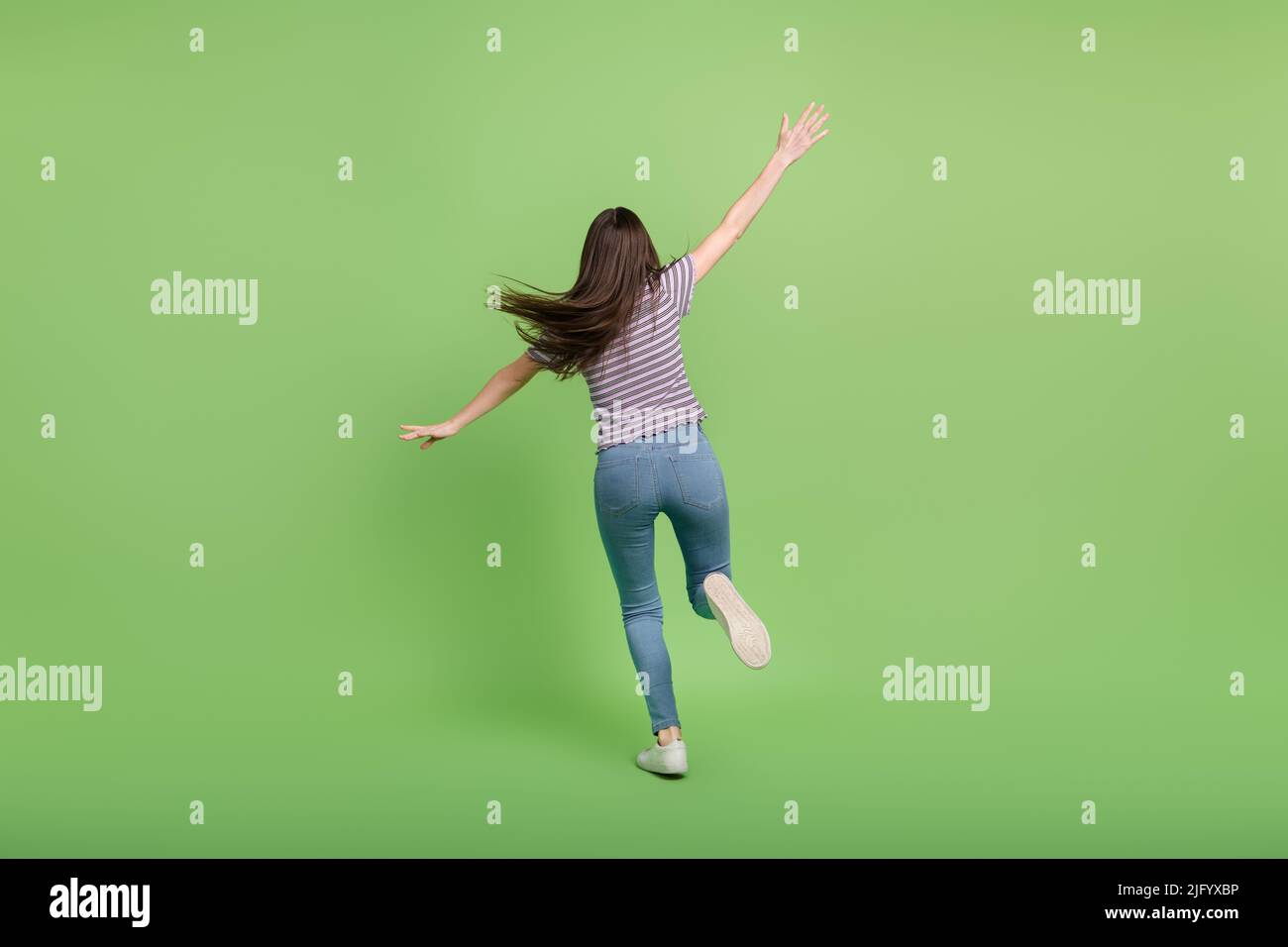 Full body rear portrait of overjoyed person raise hands rush running ...
