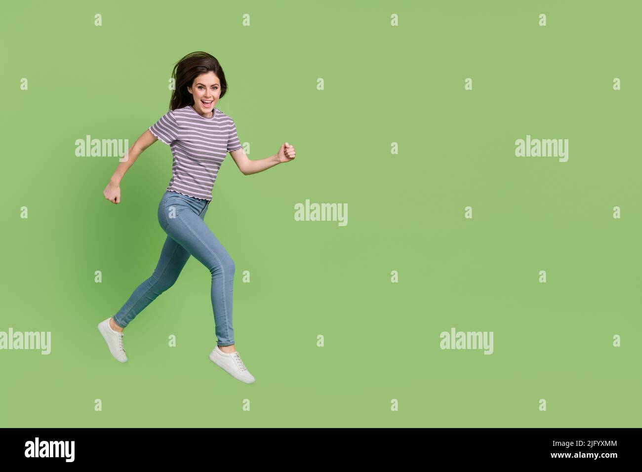 Full length body size view of attractive cheerful thin girl jumping ...