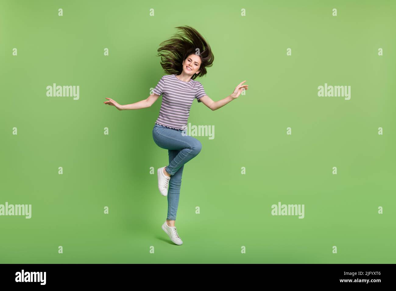 Full body photo of overjoyed cheerful person have fun jumping toothy ...