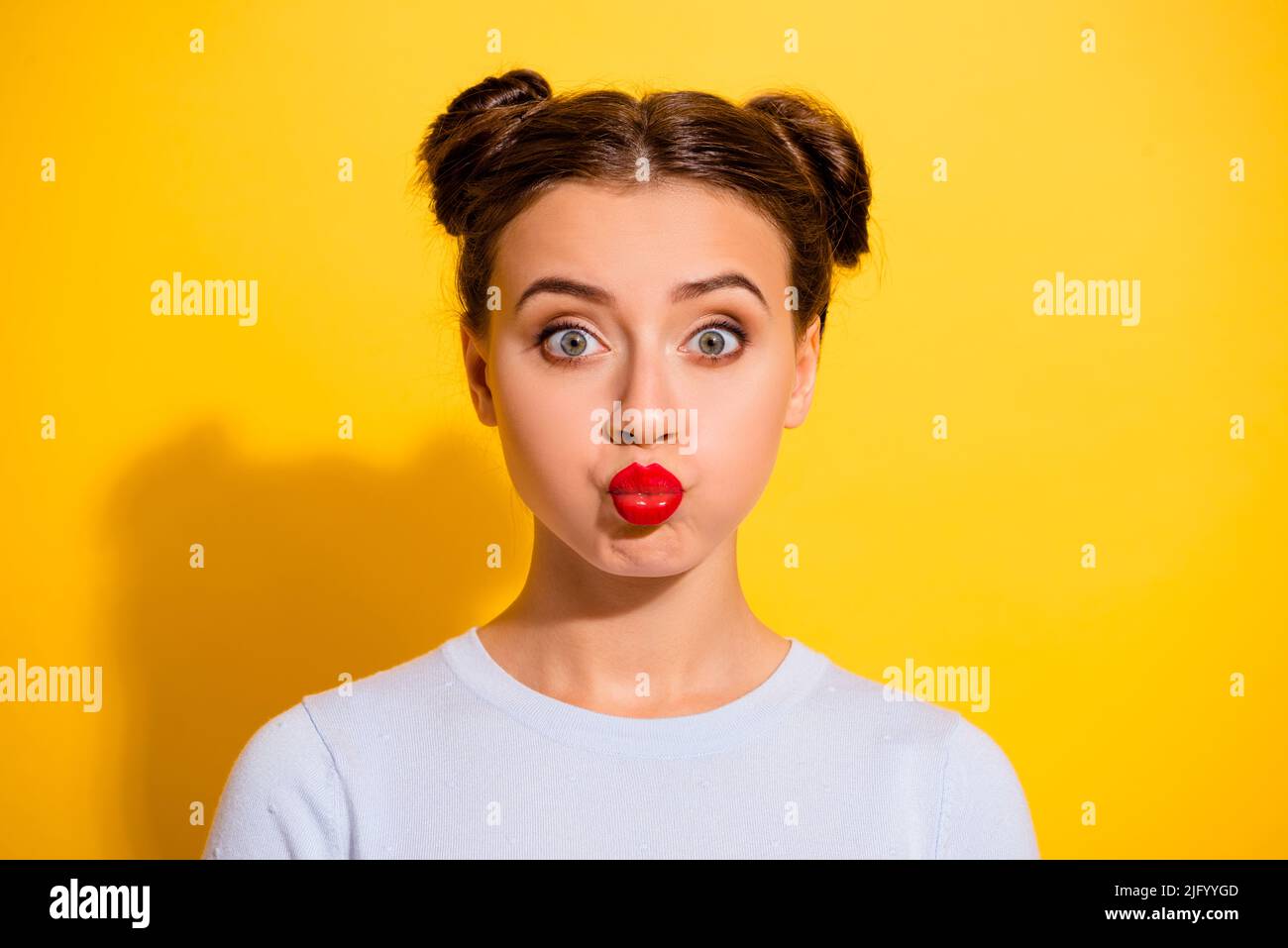 Photo of shiny sweet lady wear long sleeve sending you kiss bloated ...