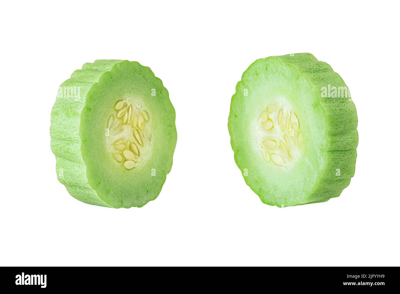 Two slices with fruit juicy pulp and seeds of Armenian cucumber or ...