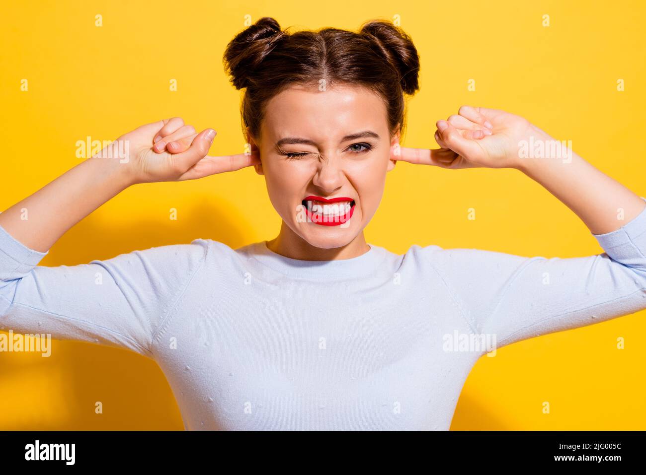 Photo of angry lady suffer noisy music hide ears fingers isolated vivid ...