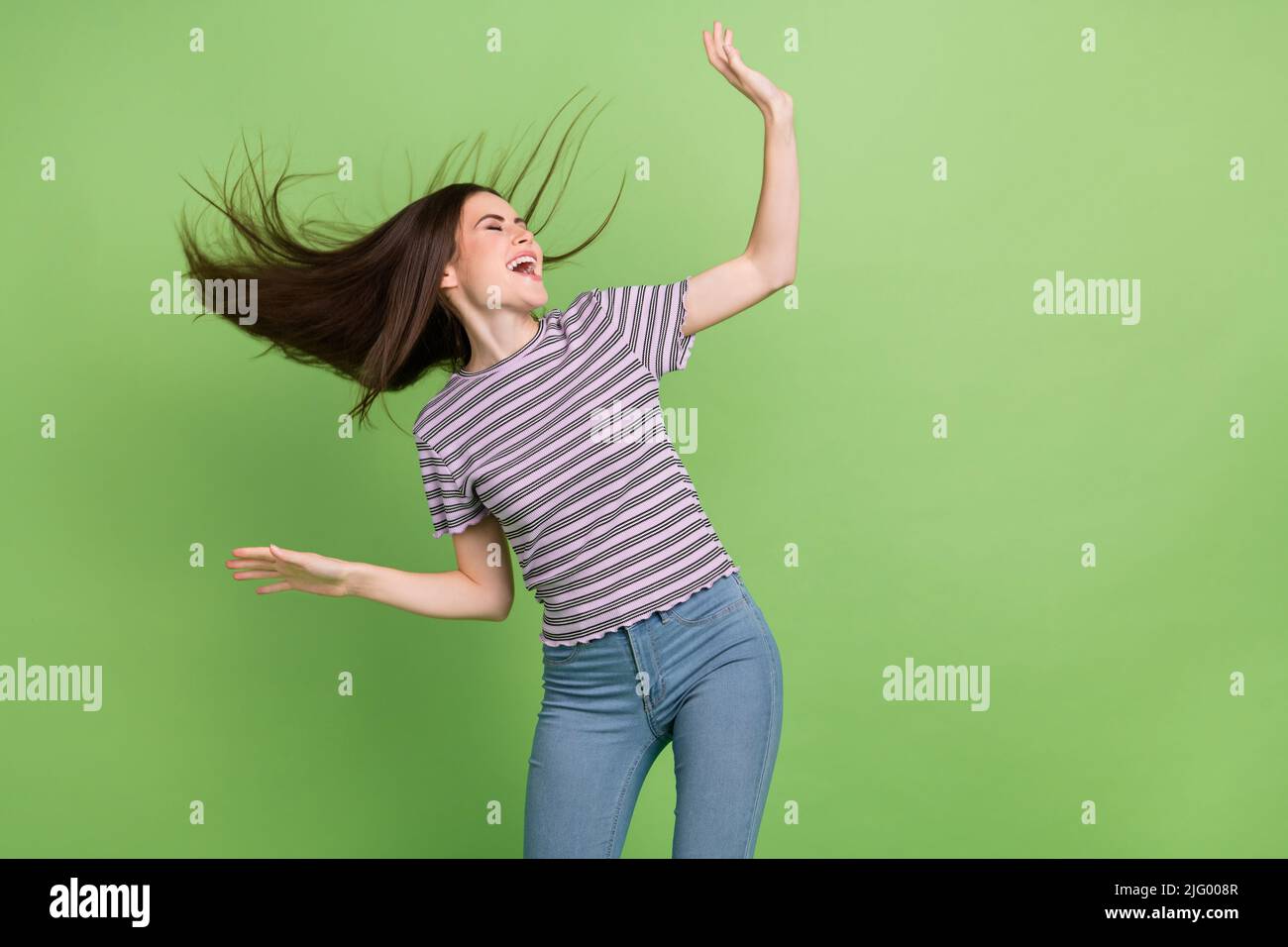 Portrait of attractive crazy cheerful brown-haired girl dancing having ...