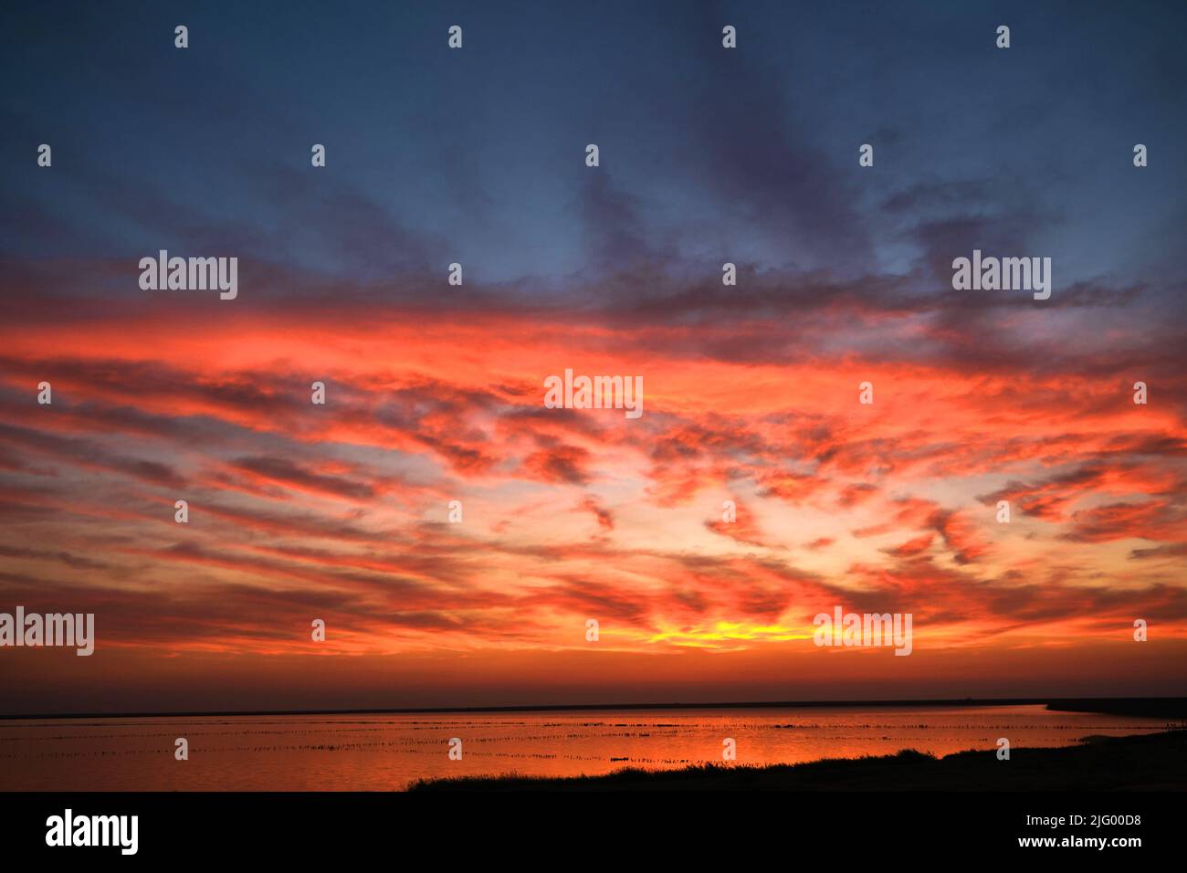 Powerful Dramatic Red Sunset Sky Stock Photo - Alamy