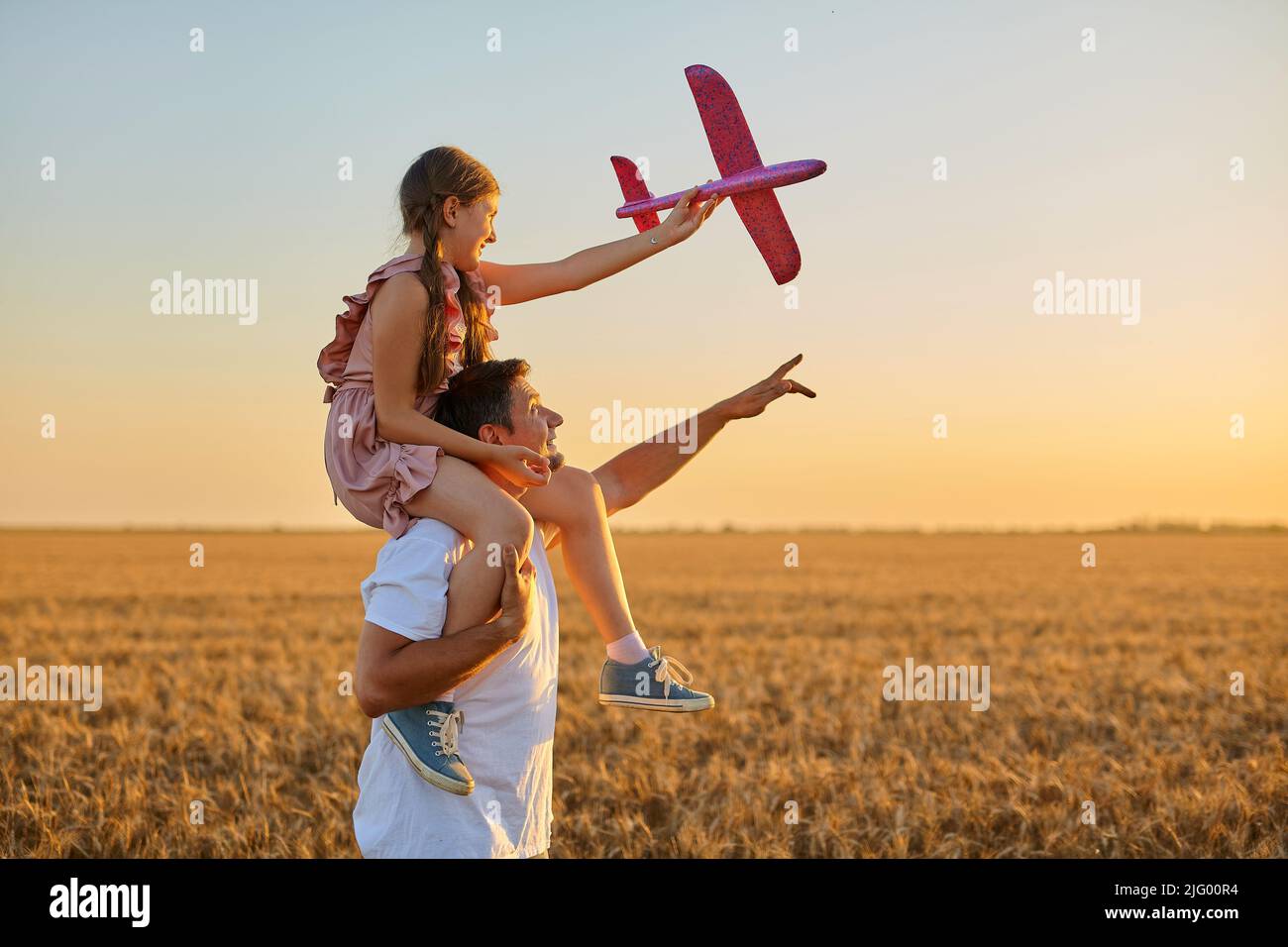 Man and girl and hand on shoulder hi-res stock photography and images ...