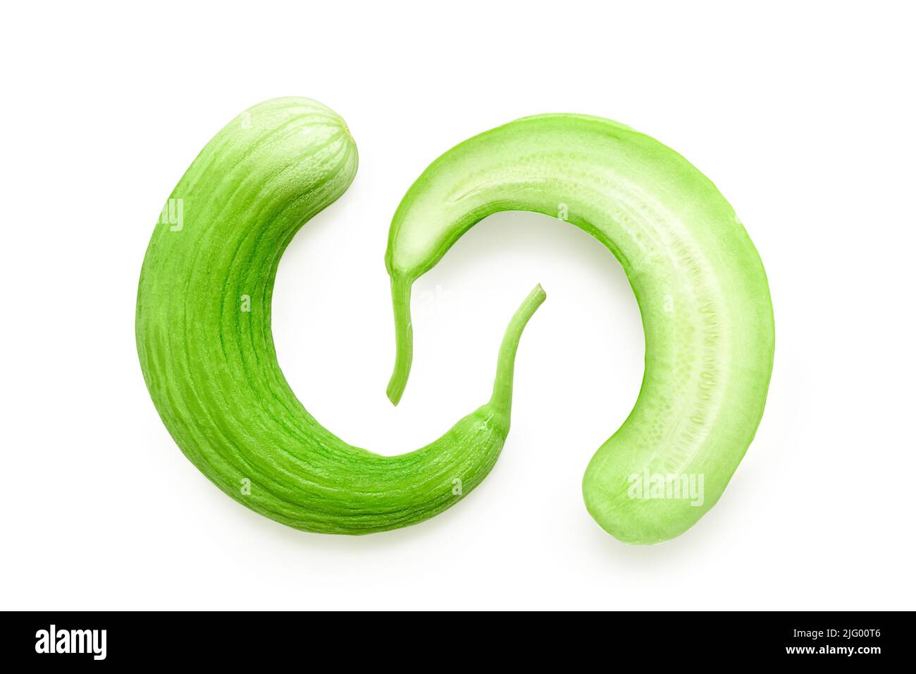 Sliced and halved Armenian cucumber or snake melon with fruit pulp ...