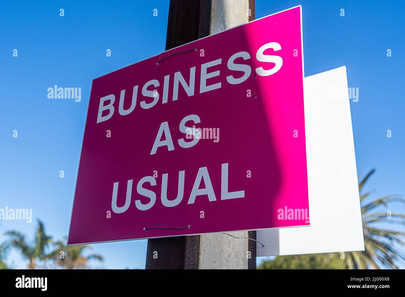 6 July 2022: Business as usual sign Stock Photo - Alamy