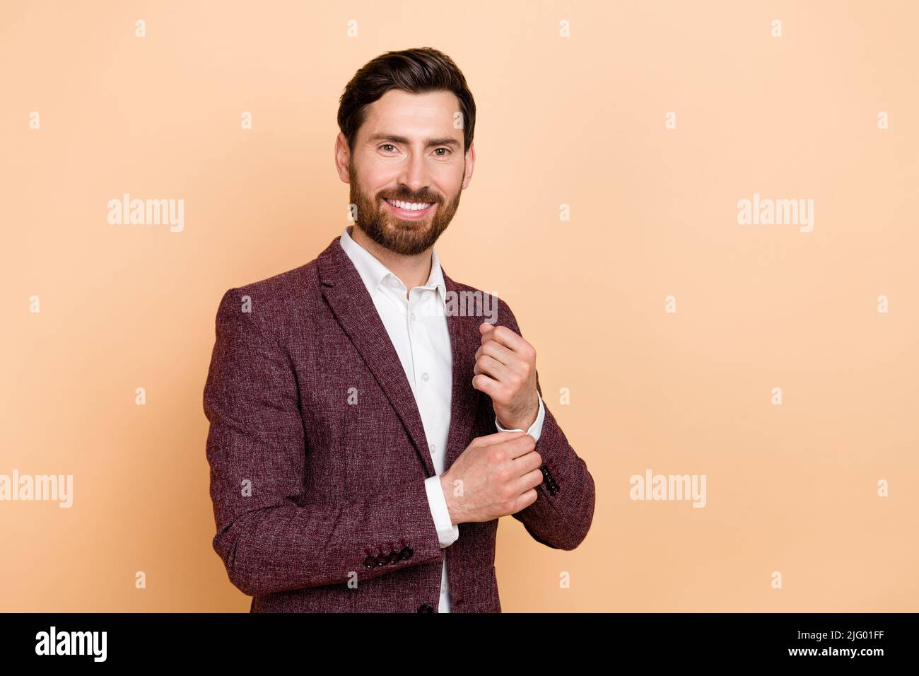 Photo of intelligent good looking businessman company owner adjust his ...