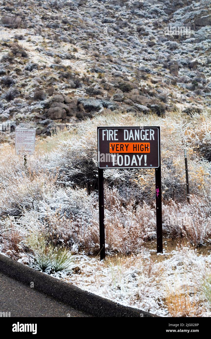 A vertical shot of a road sign with a "Fire danger, very high today ...