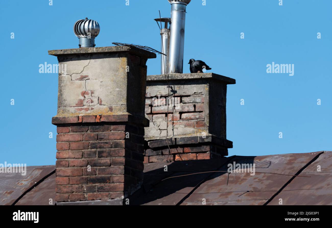 Lubaczow, Poland - March 11, 2022: Ventilation and exhaust chimneys on ...