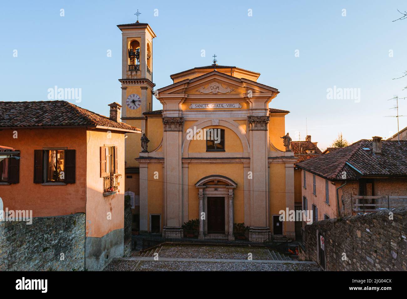 the city of Bergamo, its historic center and the hills, with the lights ...
