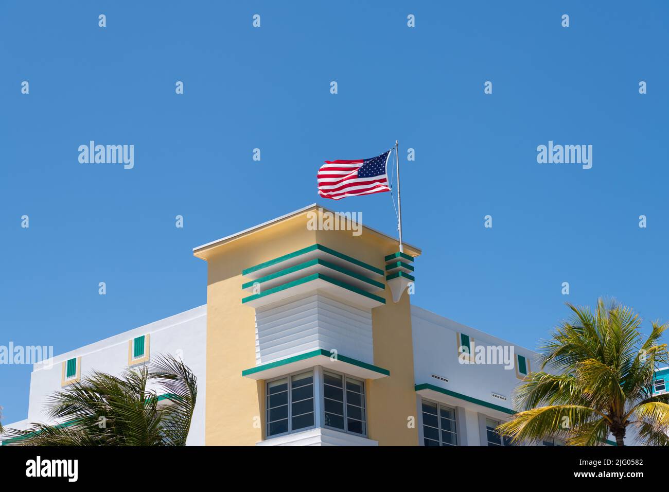 building with american usa national flag. independence day Stock Photo ...